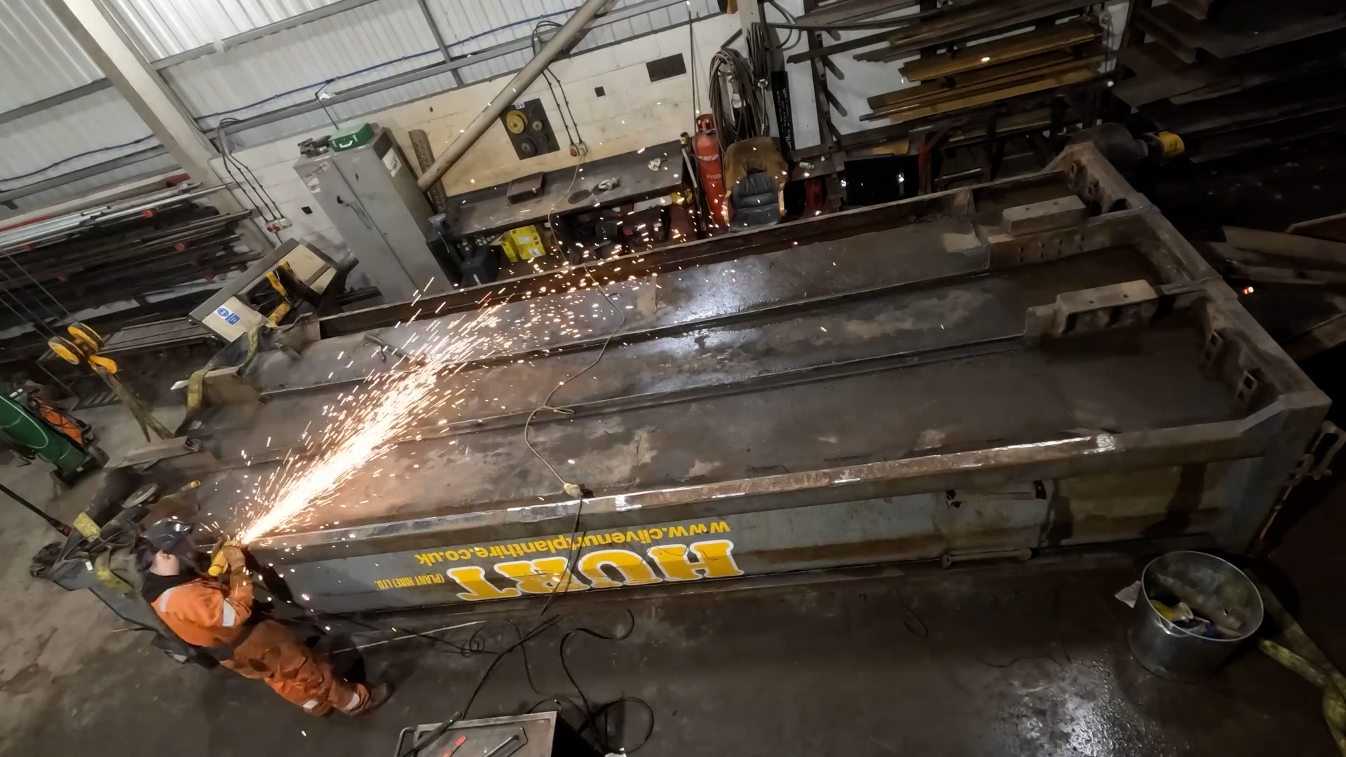 Industrial metal grinding on large steel structure