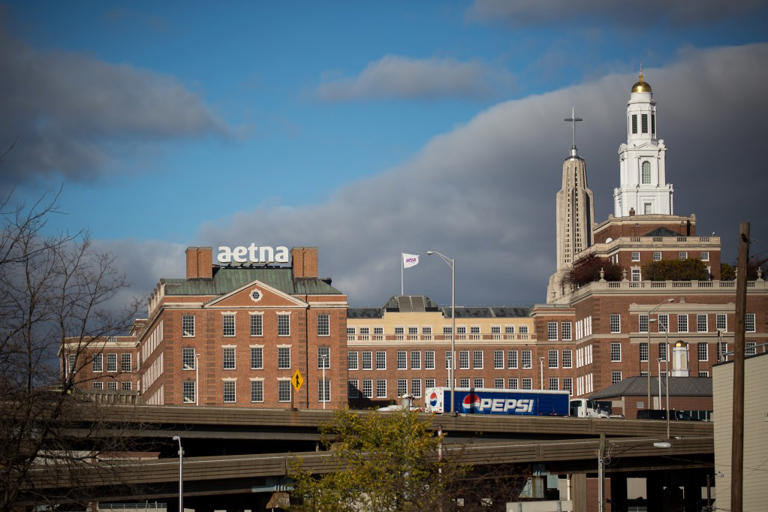 Gunman armed with 'AR-style pistol' tackled by security after entering ...
