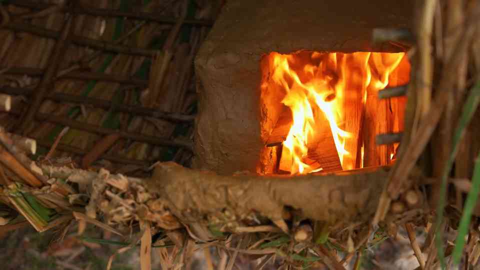 Authentic village method for smoked fish straight from a reed smoker