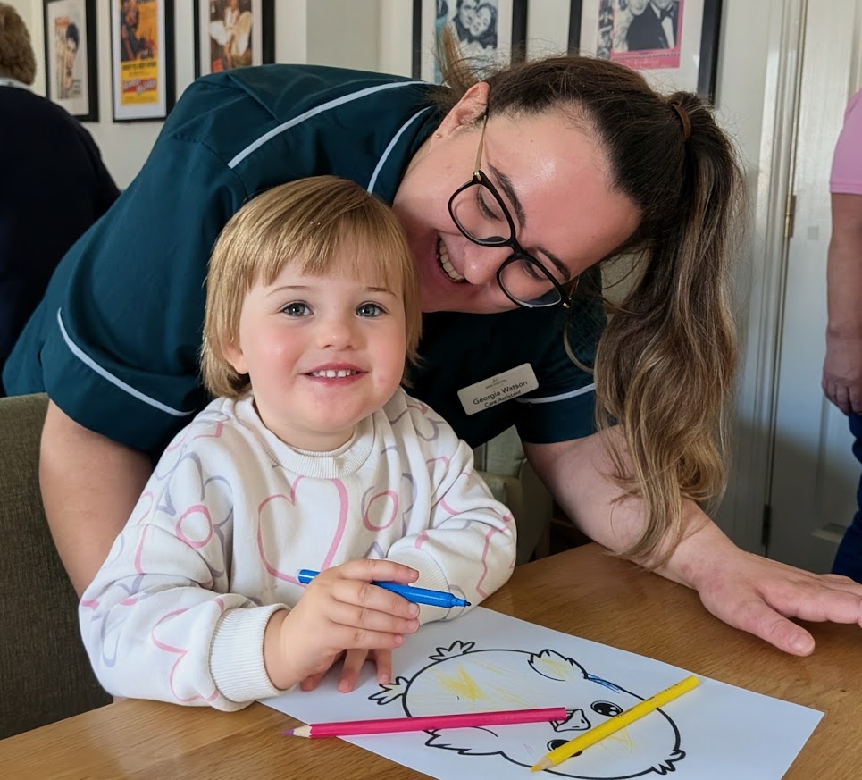 Care home celebrates World Art Day with local nursery