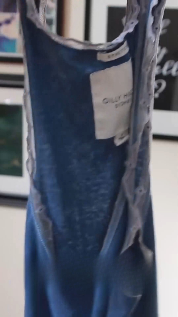Fast trick to turn any old tank top into a reusable bag when you are in ...