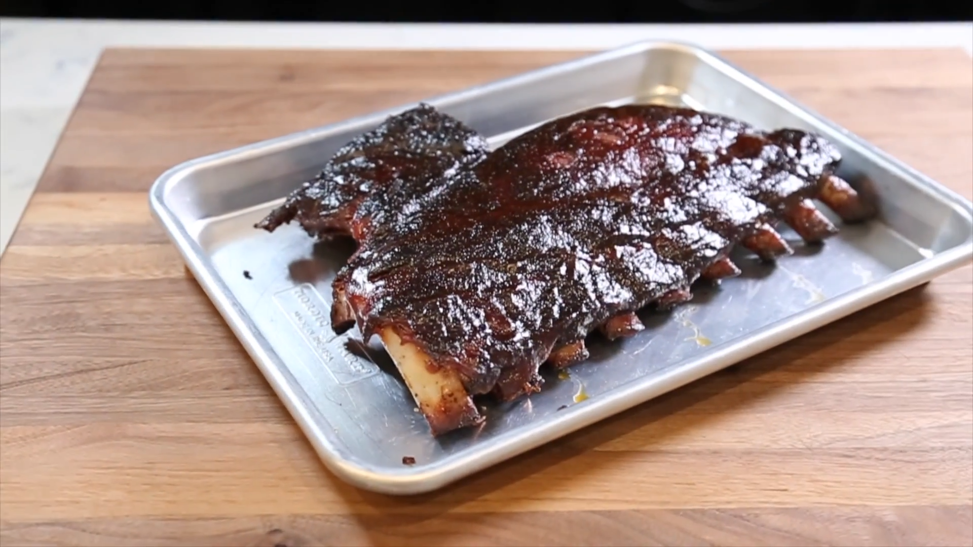 Smoking perfect baby back ribs on a Weber kettle grill