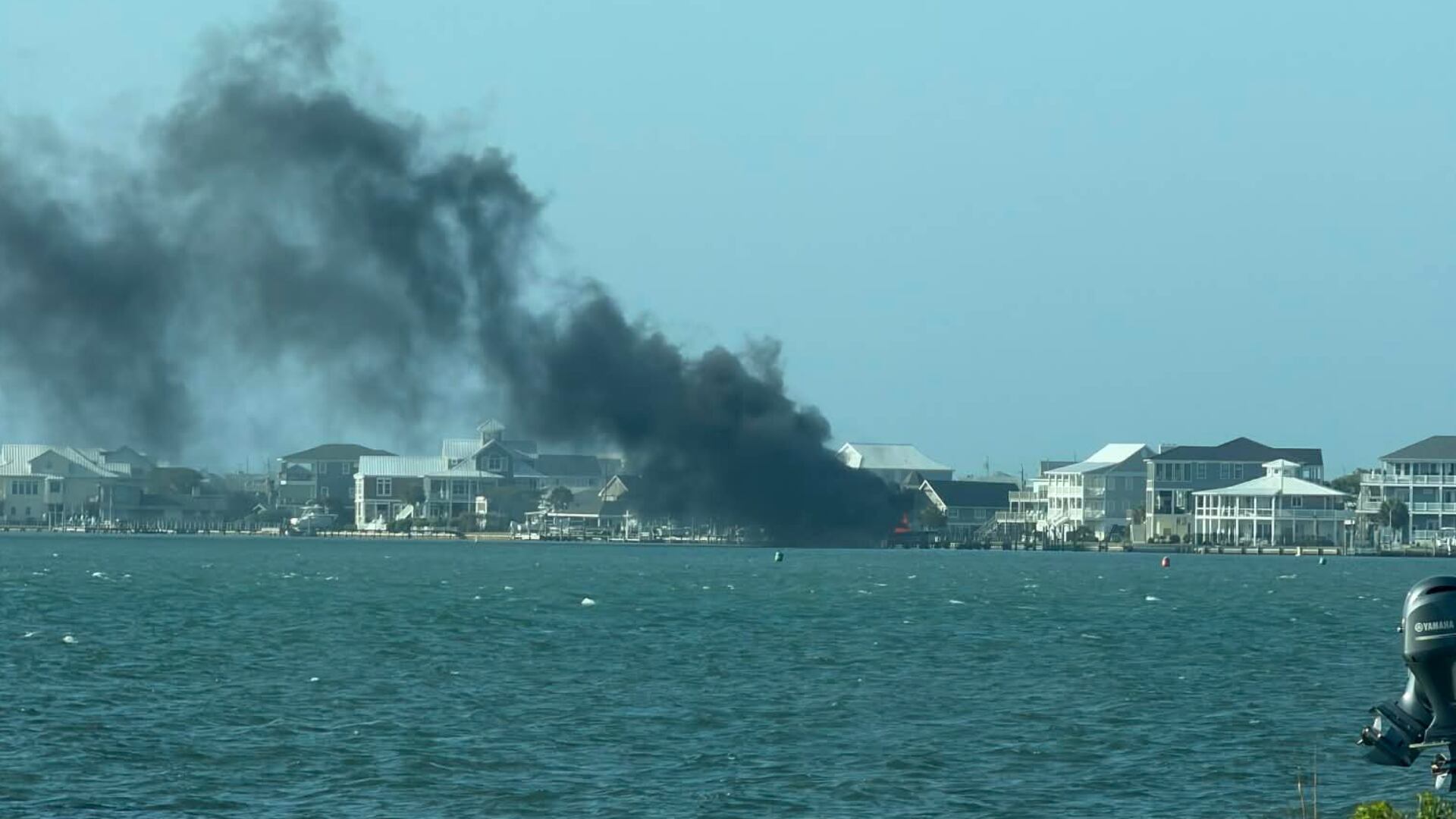 Boat catches fire on dock in Atlantic Beach, investigation underway