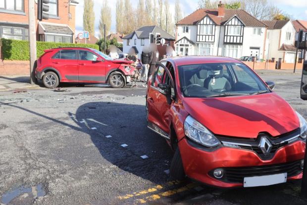 Traffic blocked after two-car crash near hospital just before rush hour