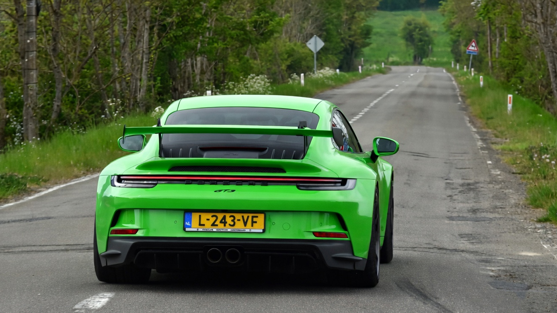 Porsche 911 GT3 wild acceleration on scenic country road