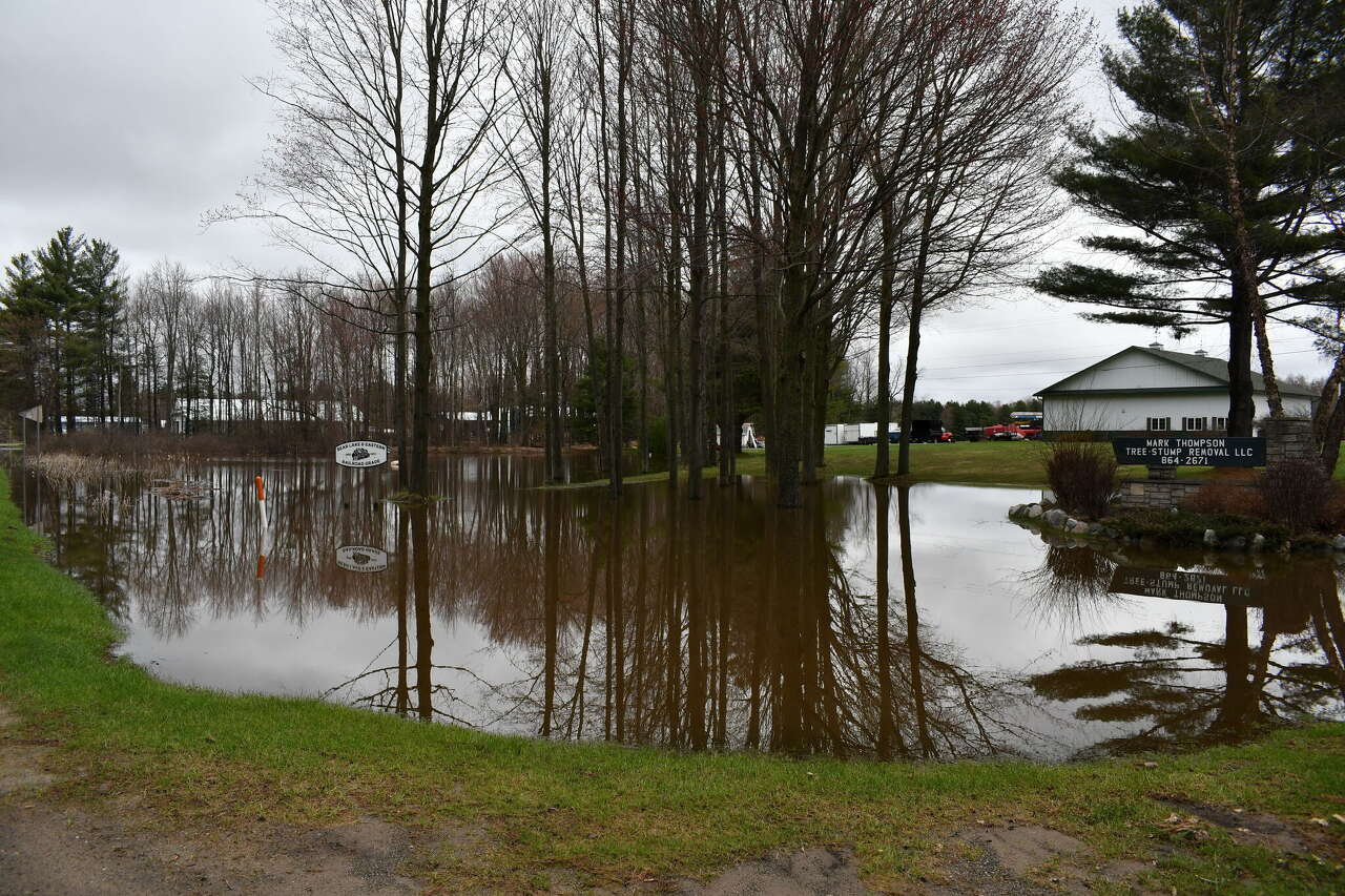 Storm damage closes roads across Manistee County as flood warning continues
