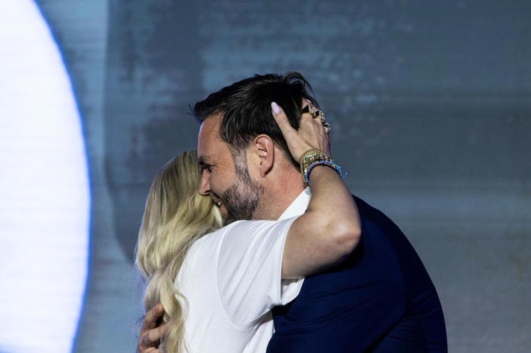 Erika Kirk rushes off stage after awkward embrace with Trump