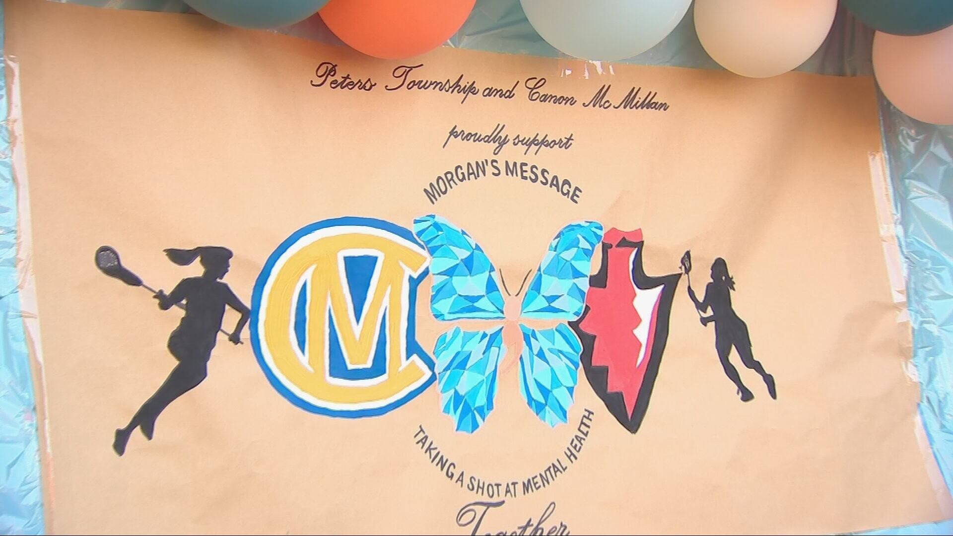 Local lacrosse teams use rivalry game to promote mental health awareness