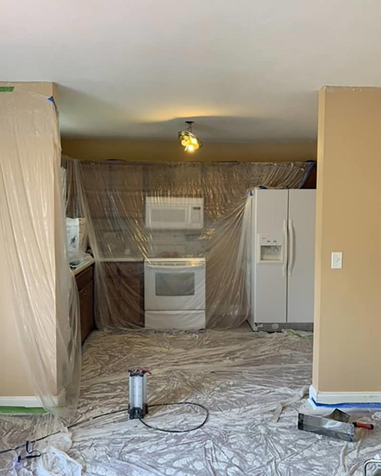 A dated '80s kitchen gets a floor-to-ceiling renovation for only $9,000