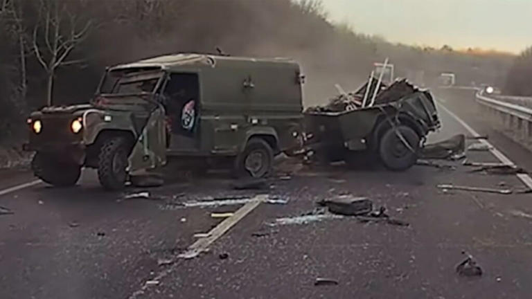 Sudden lane move flips military Land Rover, leaves driver seriously ...