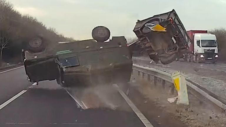 Sudden lane move flips military Land Rover, leaves driver seriously ...
