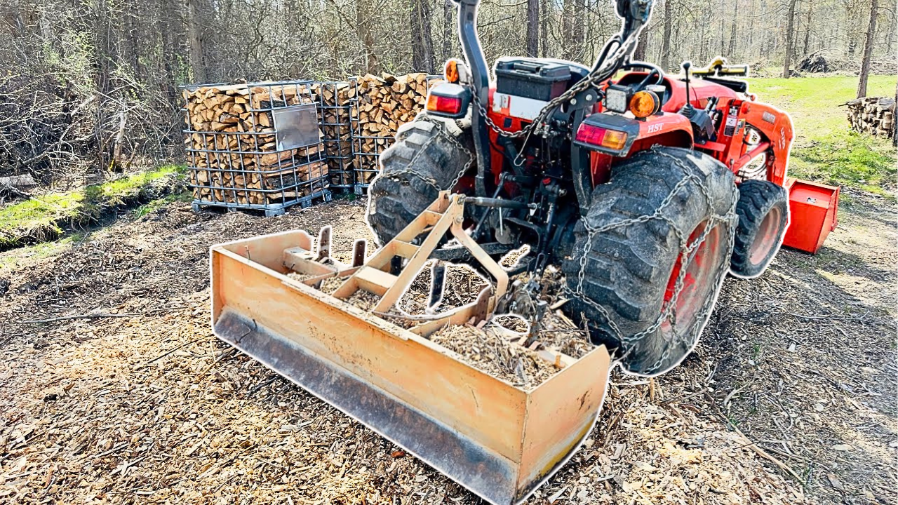 Preparing the woodyard with tractor and chainsaw