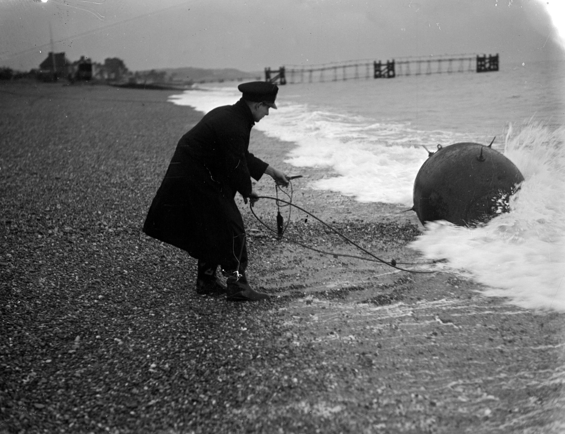 How do sea mines work, and what kind of damage can they cause?