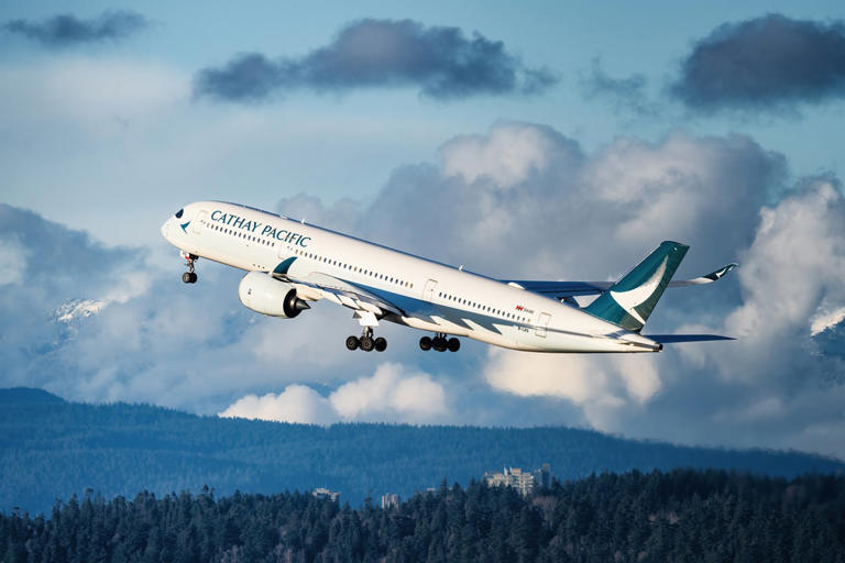Man dies after collapsing on Cathay Pacific flight from Manchester