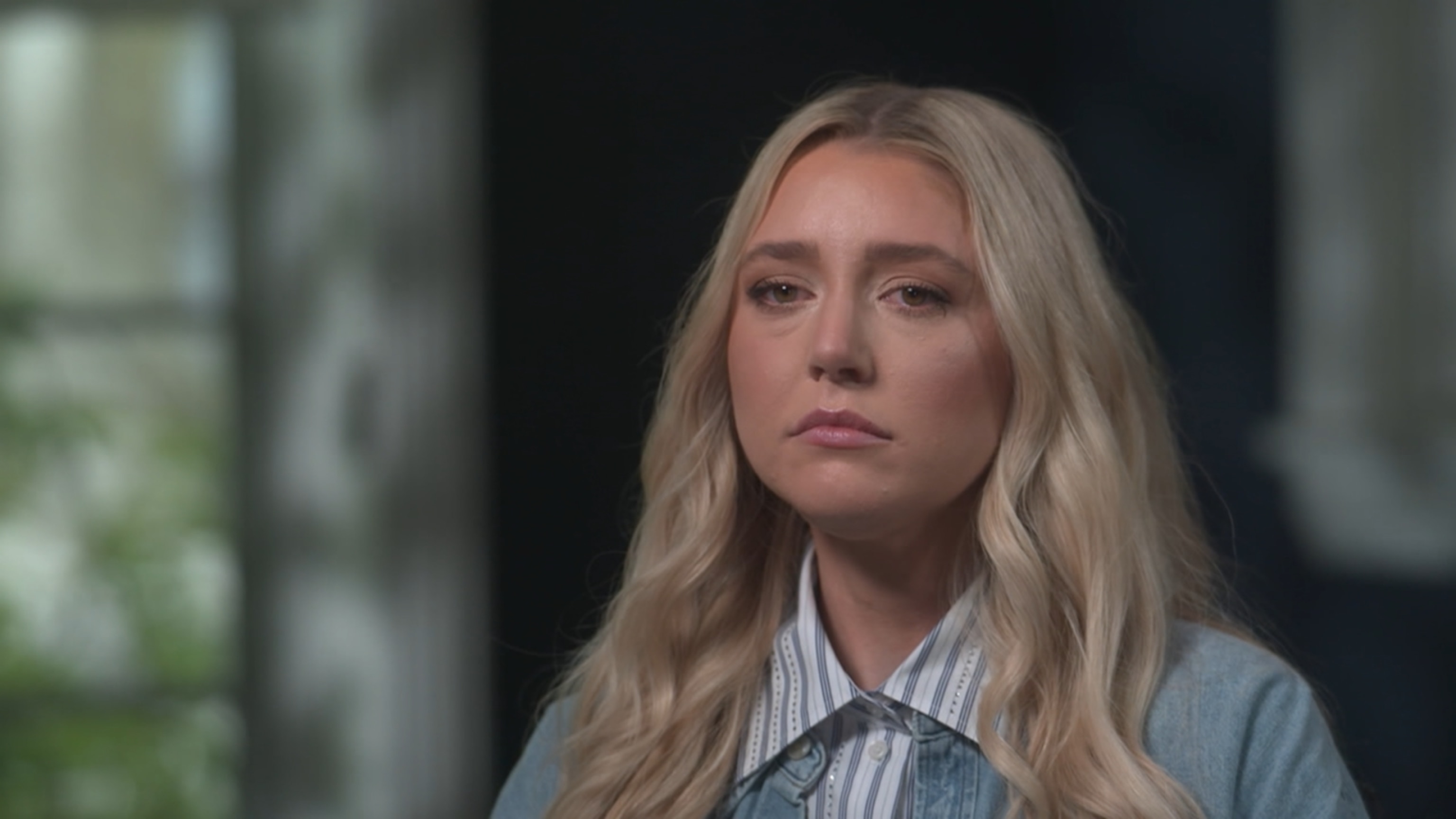 Woman at center of Michigan football coach’s firing, arrest speaks out