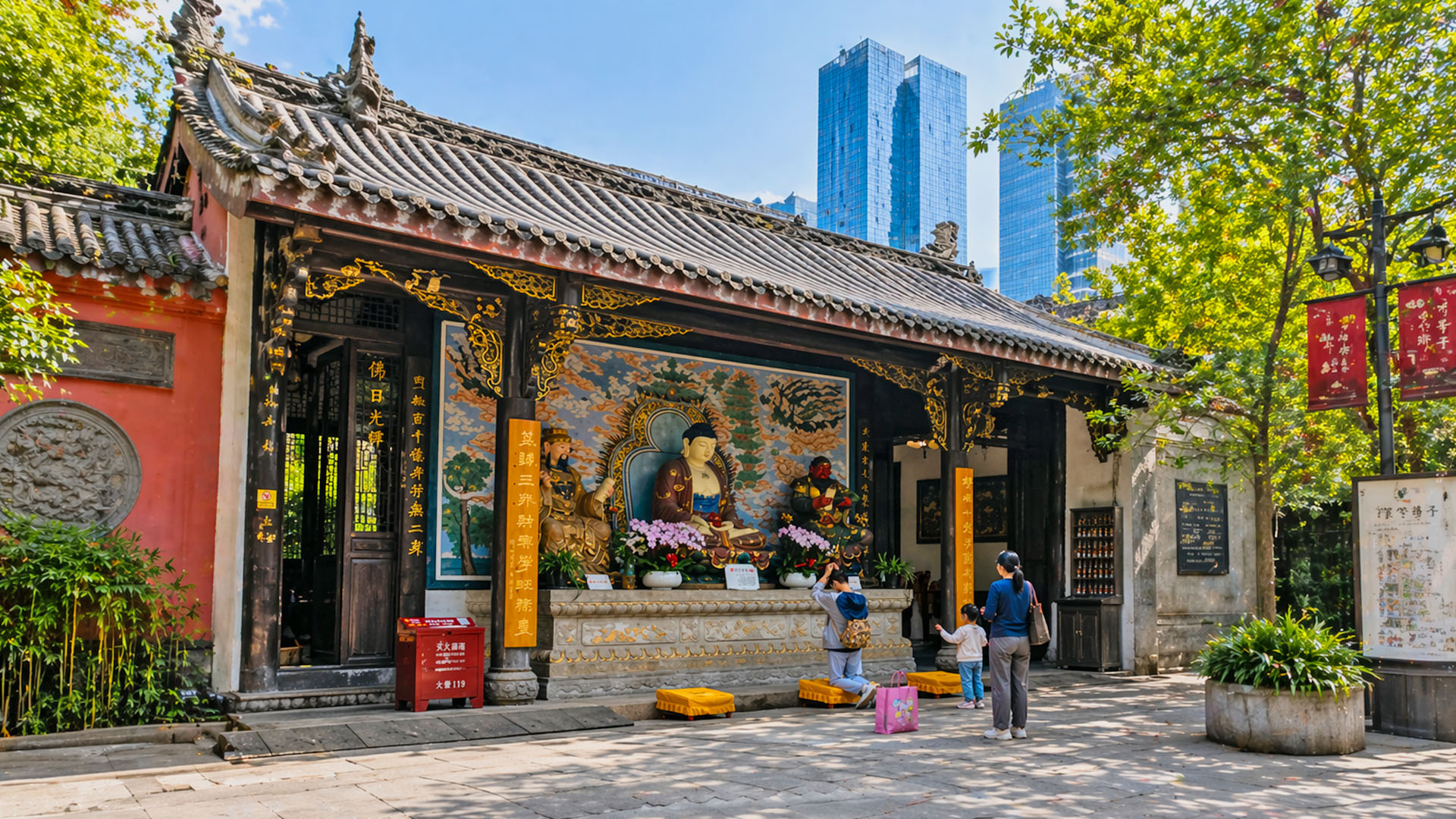 This traditional worship area feels calm while modern towers rise behind