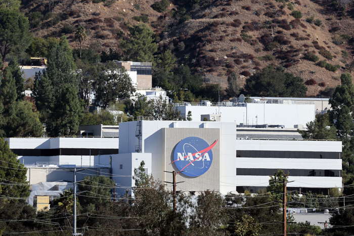 Missing nuclear lab worker found dead in New Mexico forest amid string ...