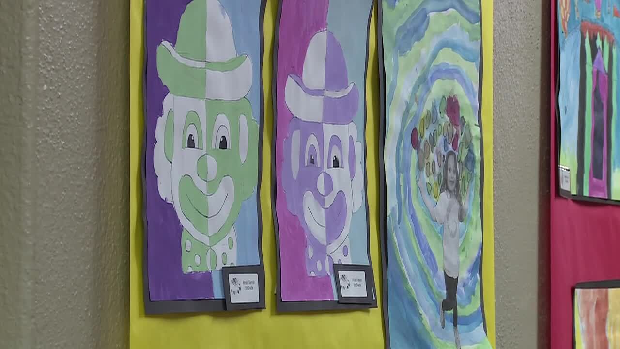Students show off their artwork at Wanamaker Elementary School event
