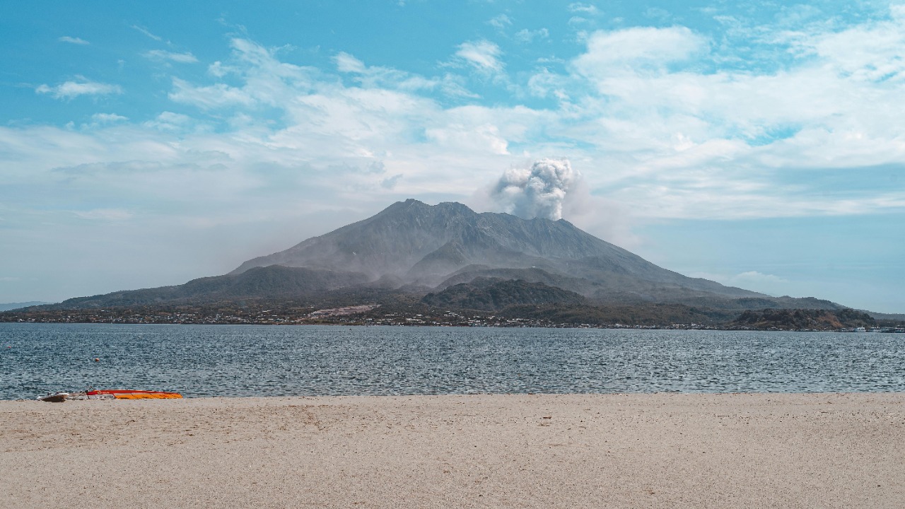 Central Coast beach 'volcano' smoke traced to burning debris in sand