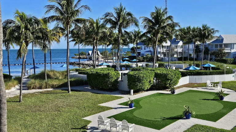 Nestled in the Florida Keys is a scenic beach resort with white sands ...
