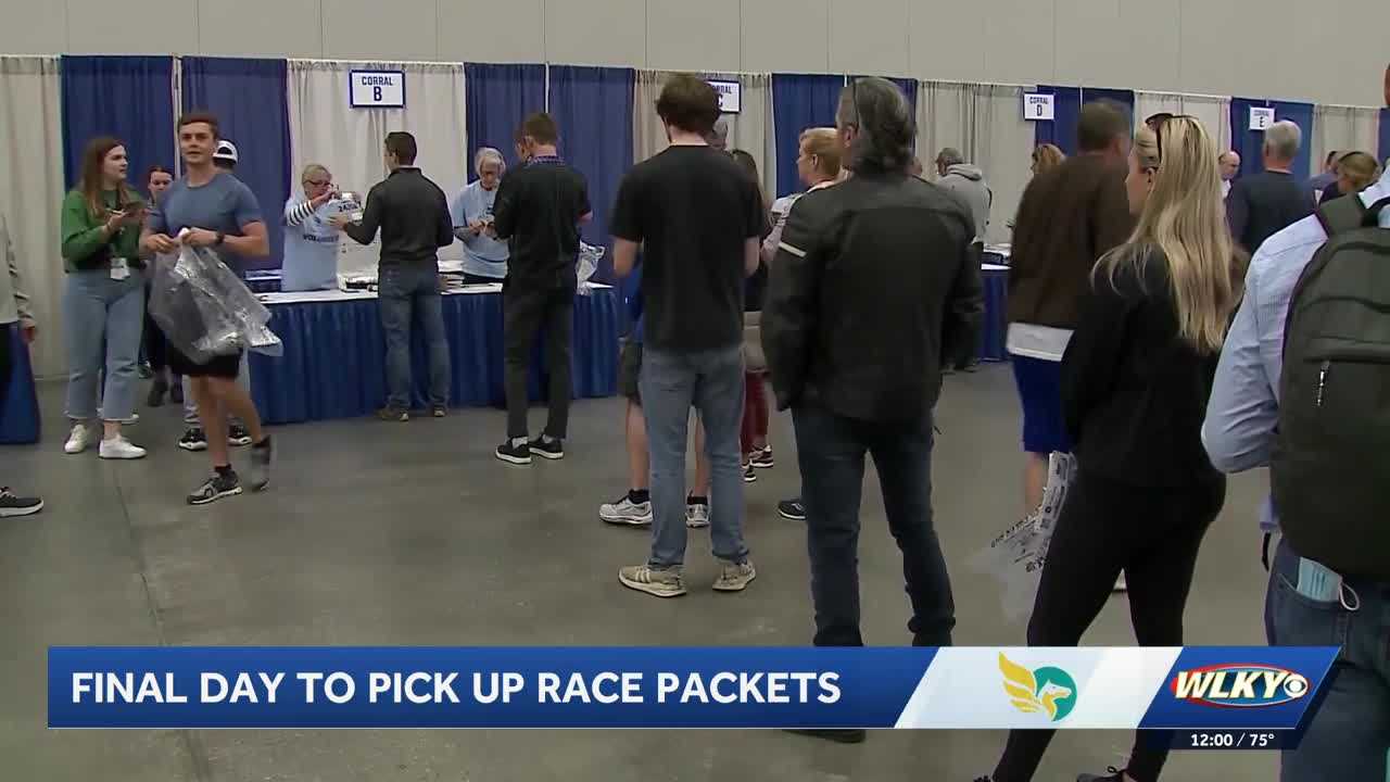 Runners pick up race packets ahead of the Kentucky Derby Festival ...