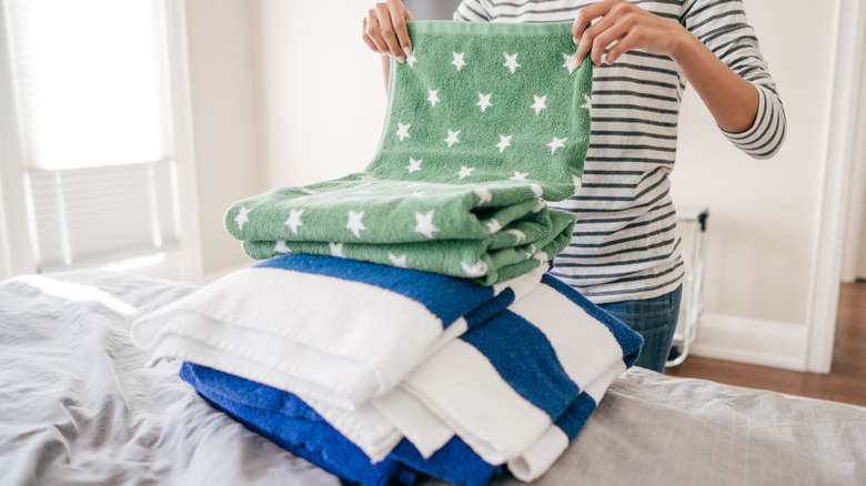 Turn an old bath towel into an eco-friendly paper towel alternative