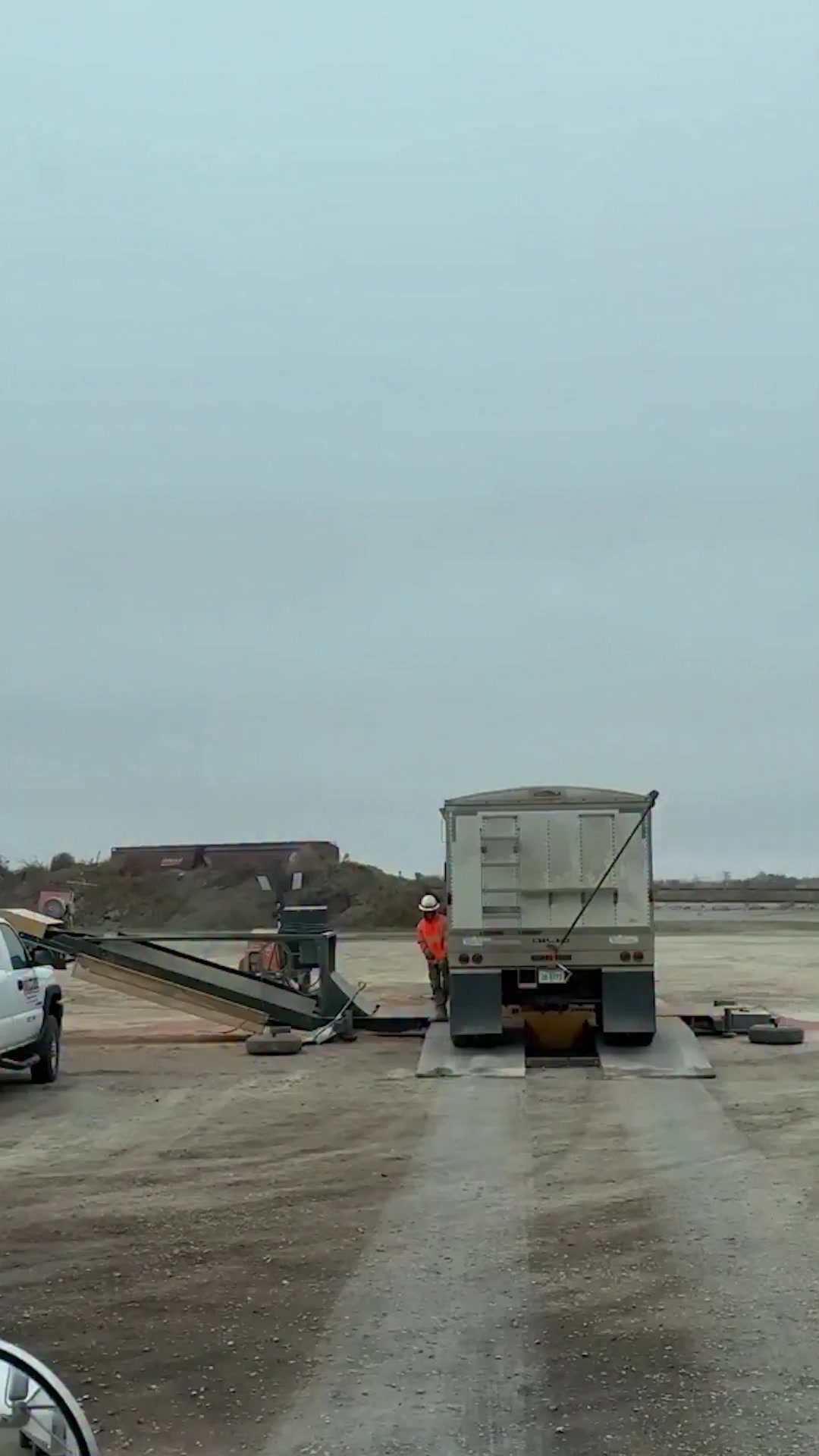 Moving and dumping large farm piles