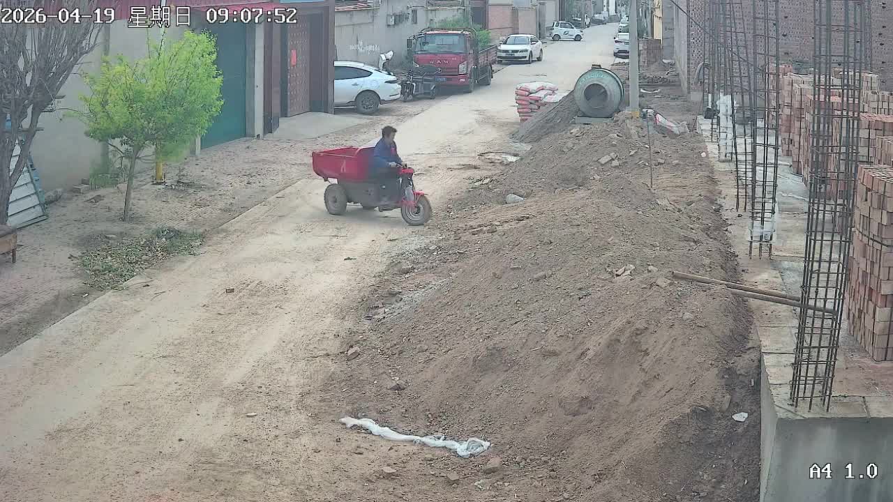 Electric cargo tricycle tips over while climbing ramp at construction ...