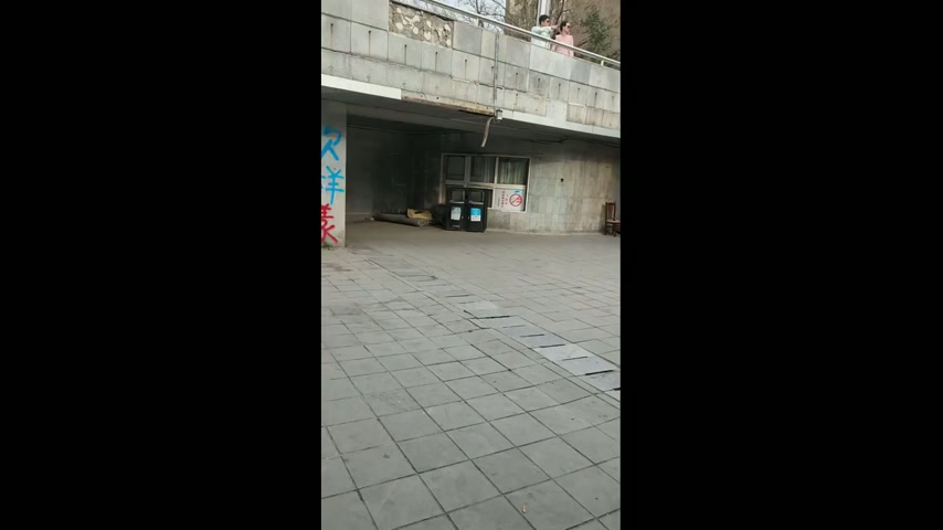 Unexpected goal leaves man laughing during outdoor football play in ...