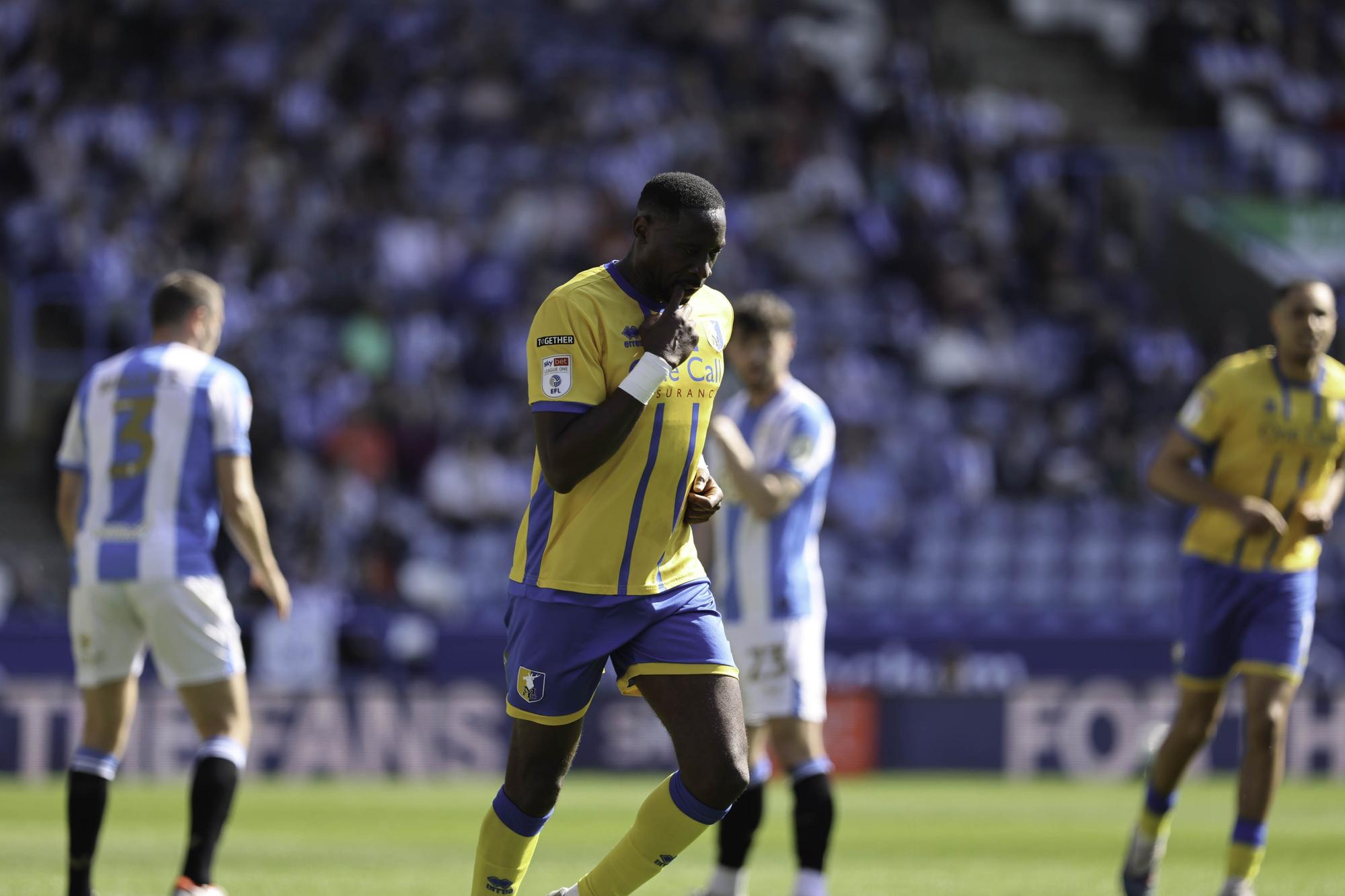 Mansfield Town secure eye-catching win at Huddersfield Town as momentum ...