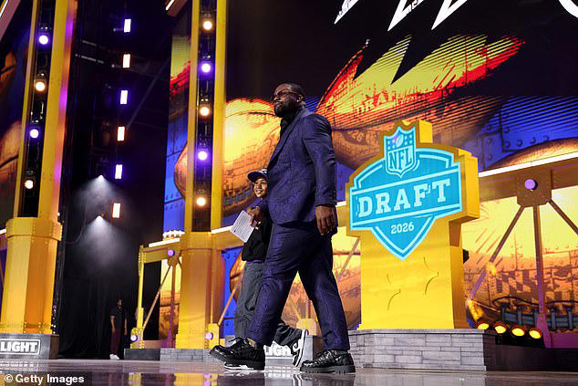Ex-NFL star sparks chaos at the draft by using his young son to troll ...