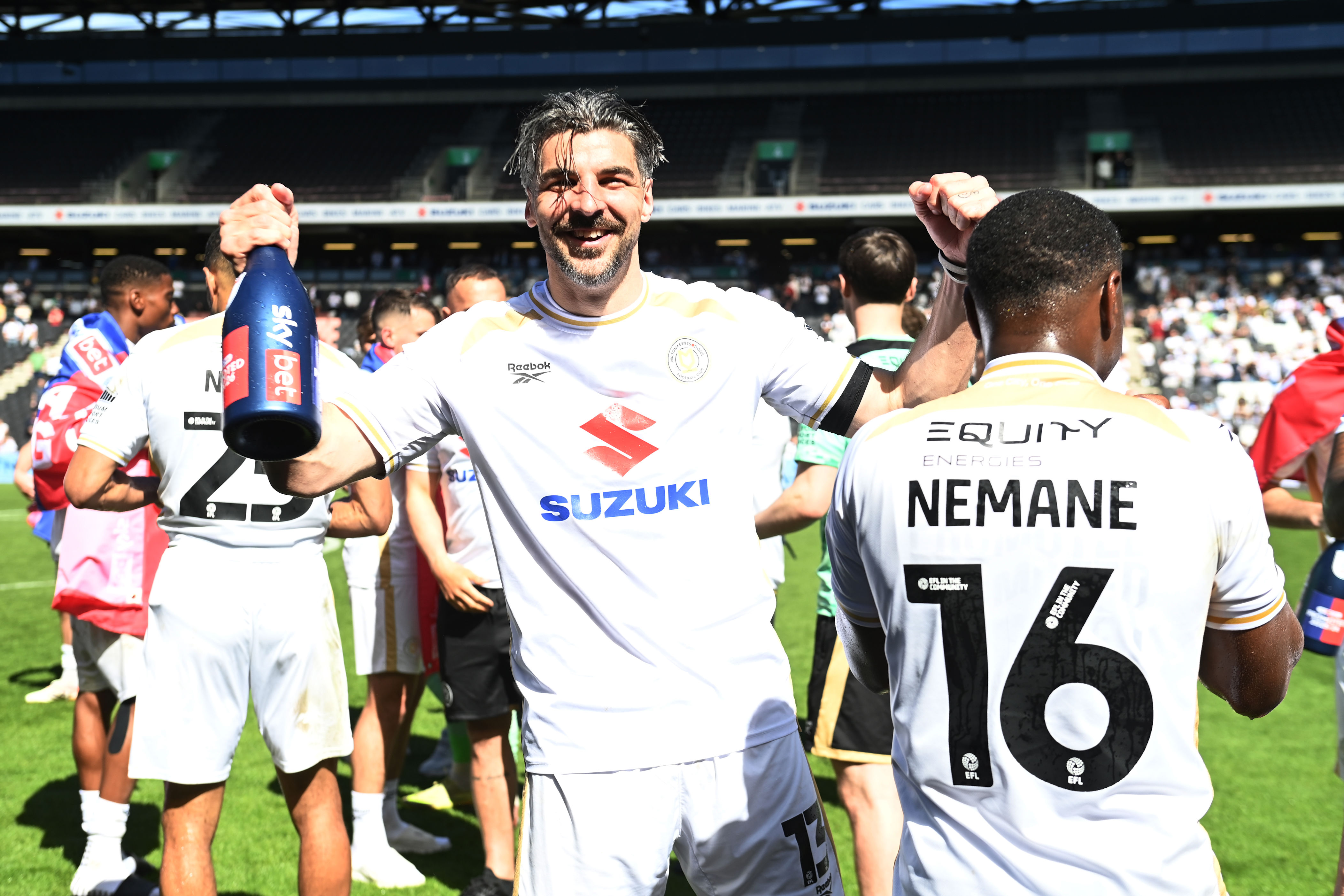 Get your hands on MK Dons' promotion trophy next week