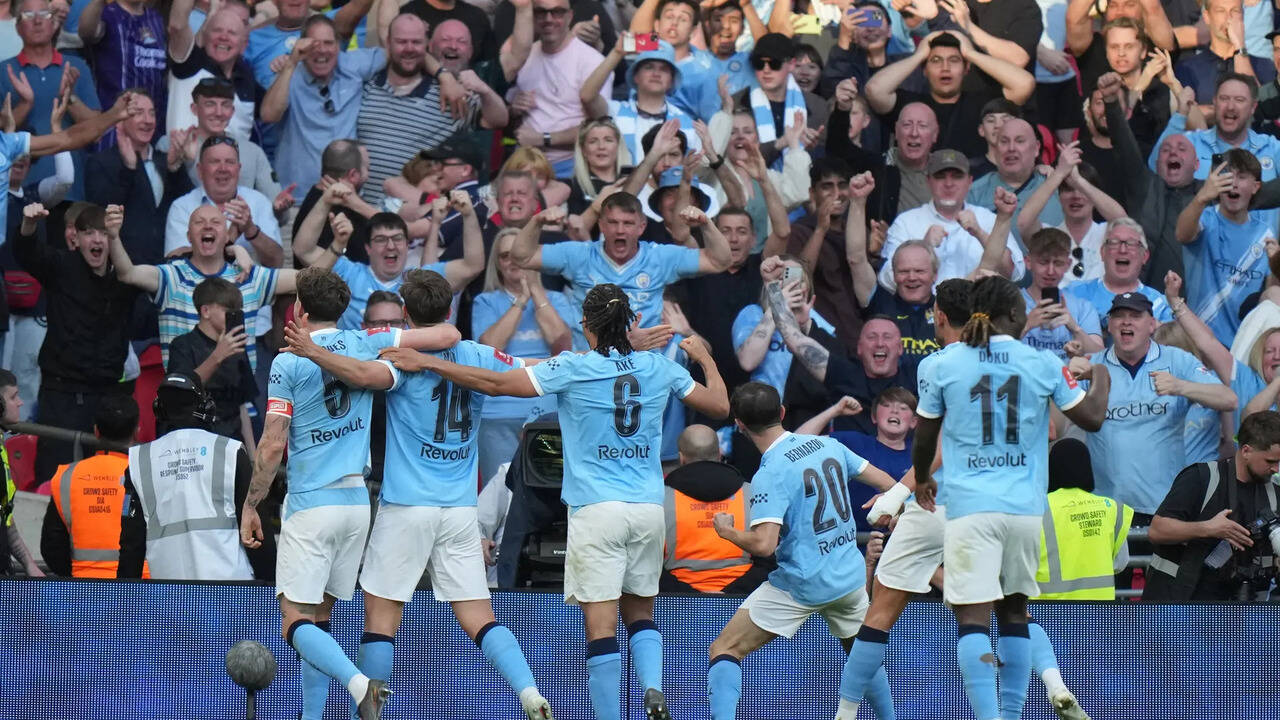 Manchester City advances to FA Cup final as Arsenal takes Premier ...