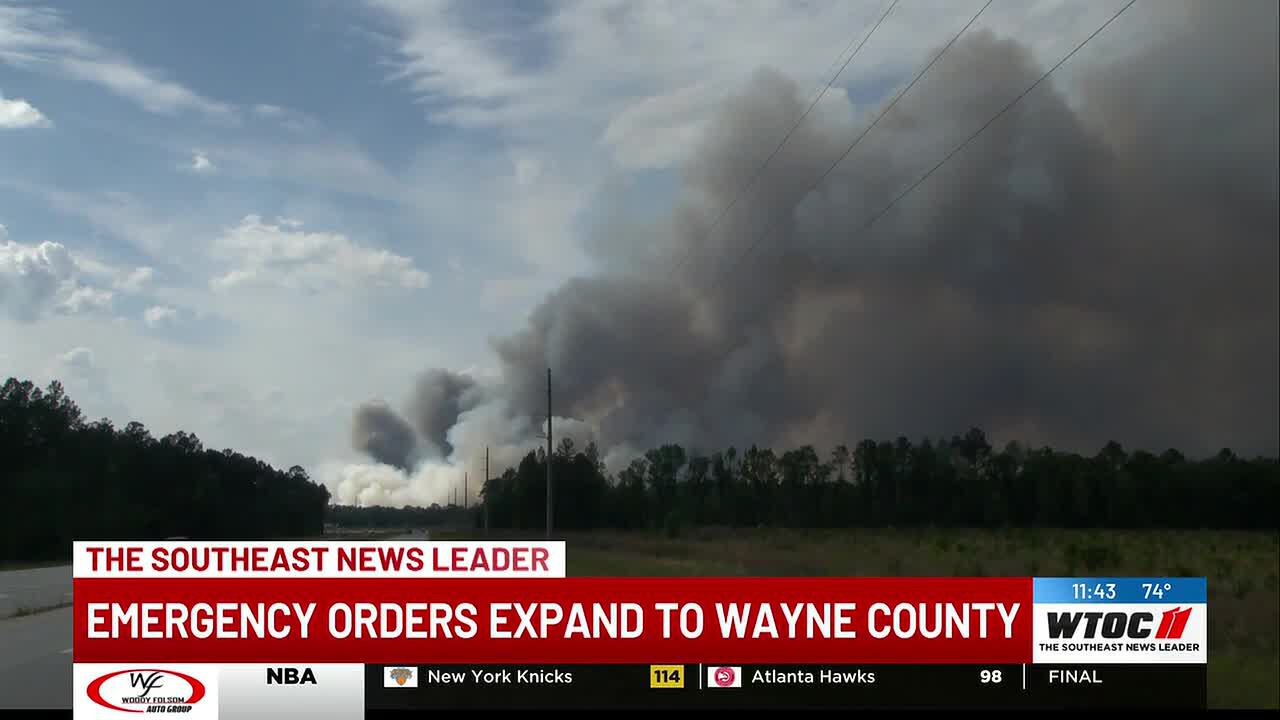 Wildfire burns for fifth day as evacuations expand to Wayne County