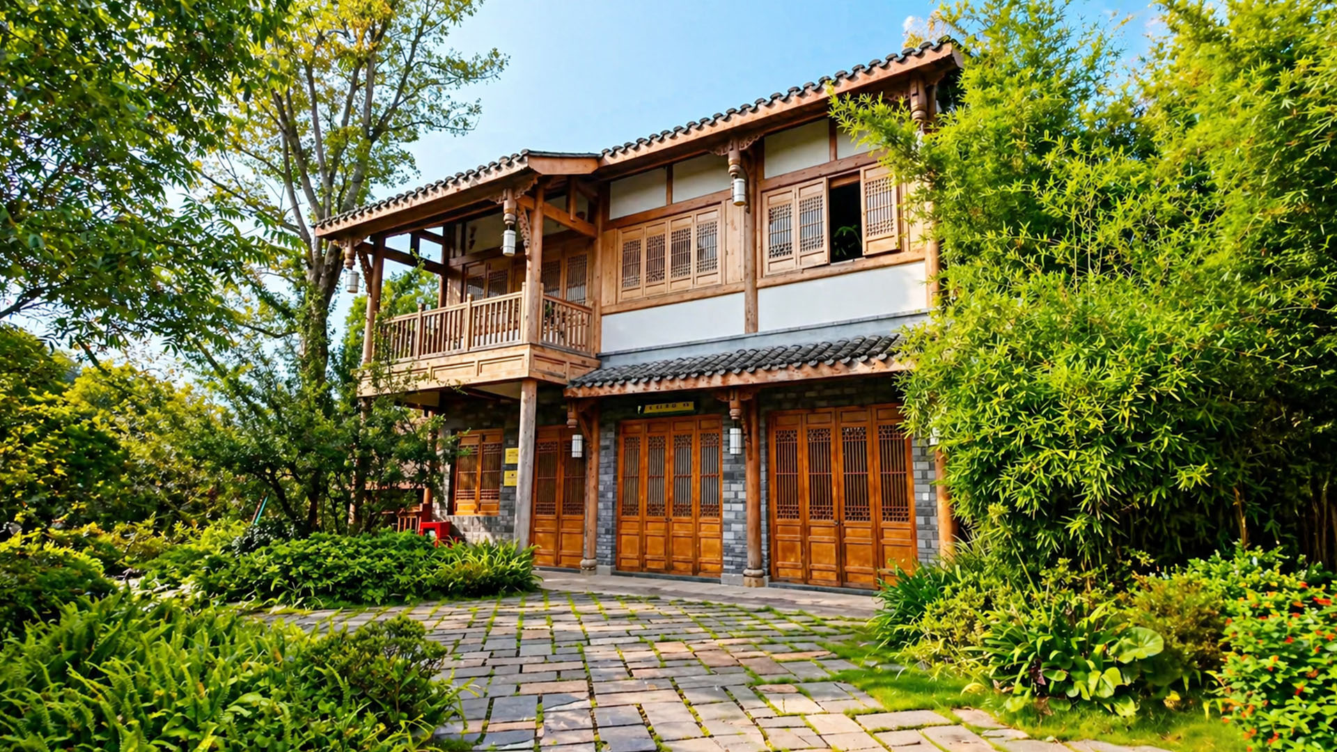 A wooden house hidden among plants with a calm natural setting