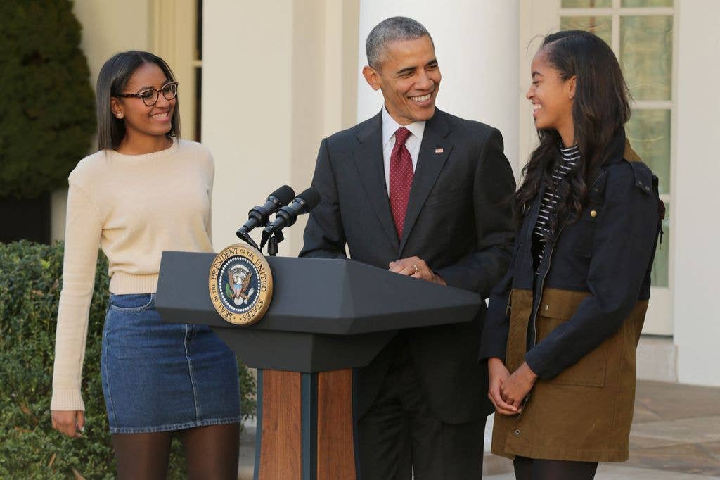 Malia Obama turns heads in black tank top and baggy jeans in latest ...