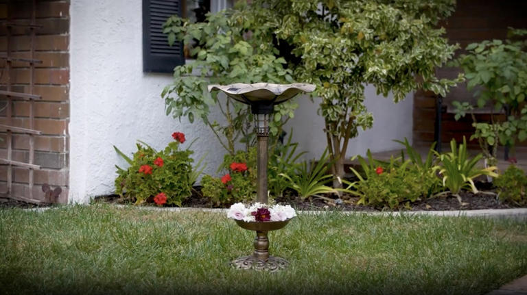 Target is selling a solar lighted birdbath that can also beautifully ...