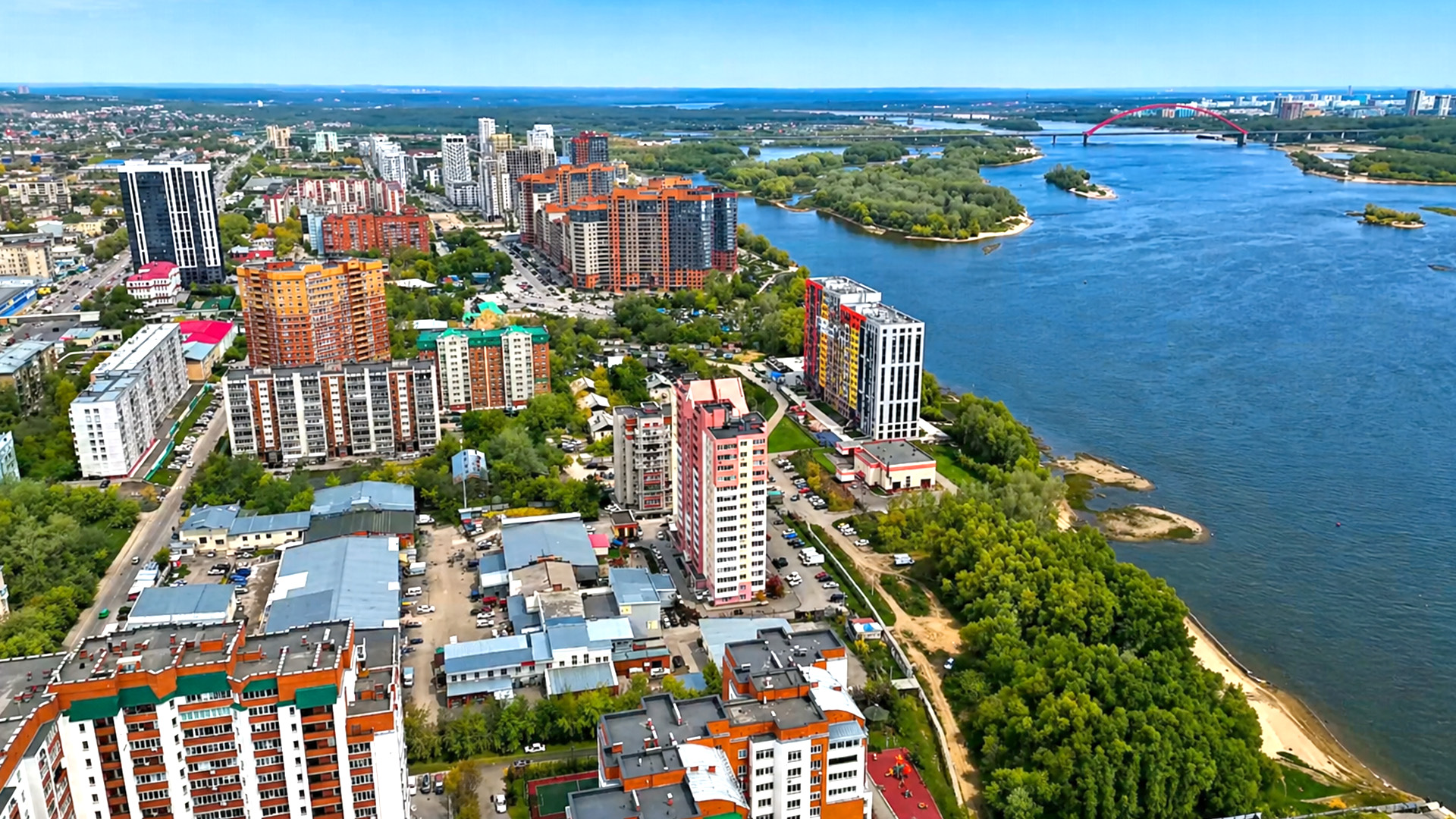 Why do these golden trees line the river through this city?