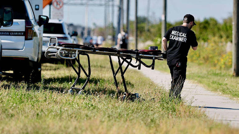 Law enforcement gathered near where divers searched for missing USF student