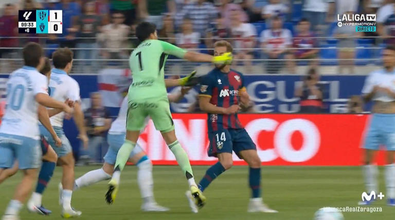 Red-carded goalkeeper punches opponent in face as Spanish soccer game ...