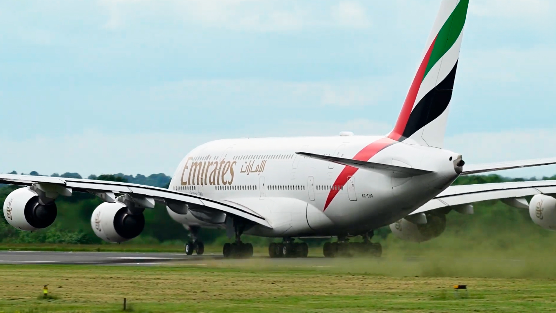 A380 engines blast water across runway at full power