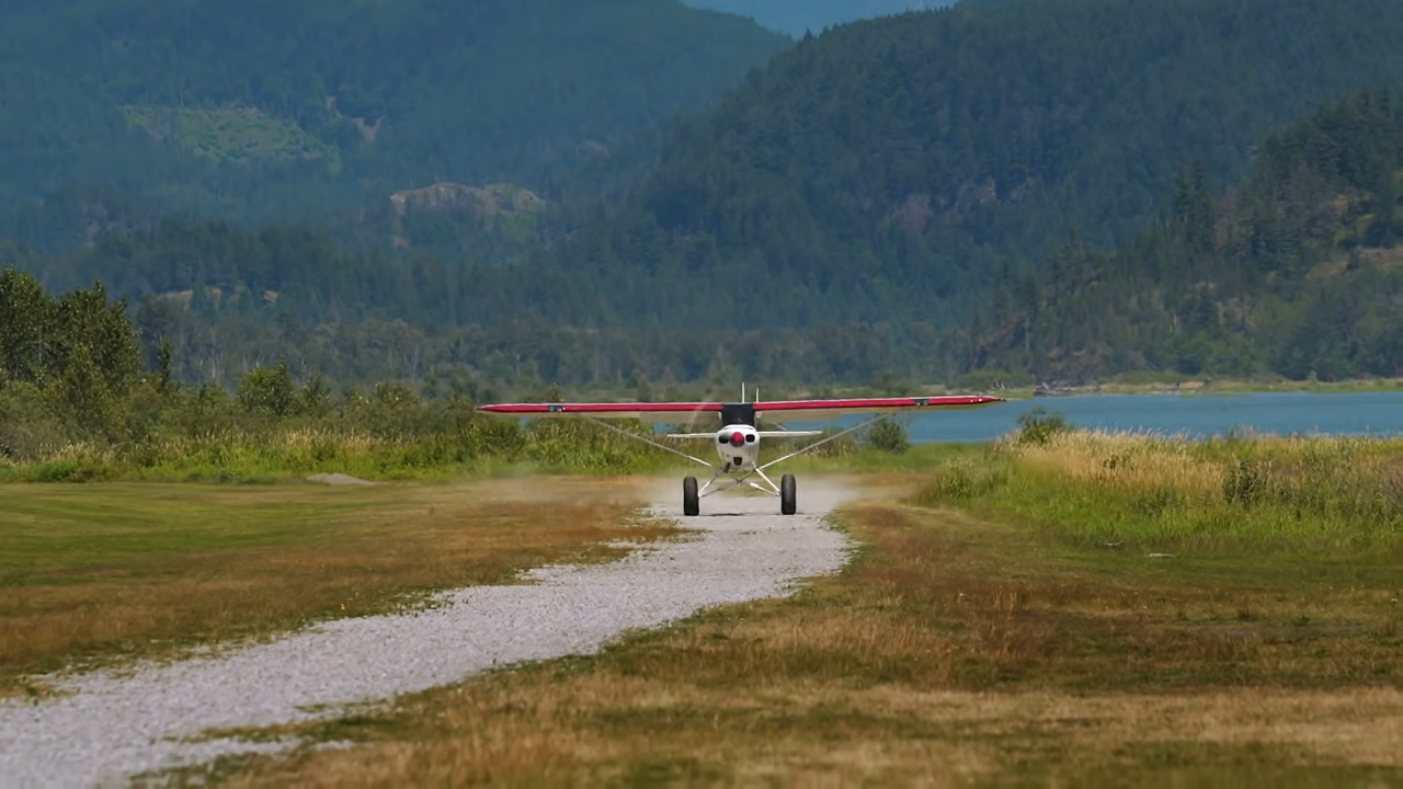 Watch 3 aircraft land on a golf course, sandbar and mountain - "Unreal"