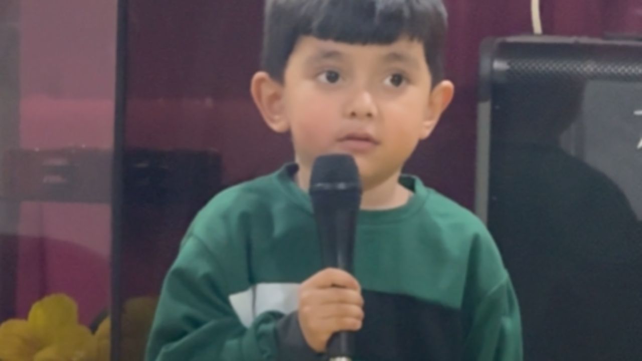 Little boy briefly disappears during church song and returns laughing