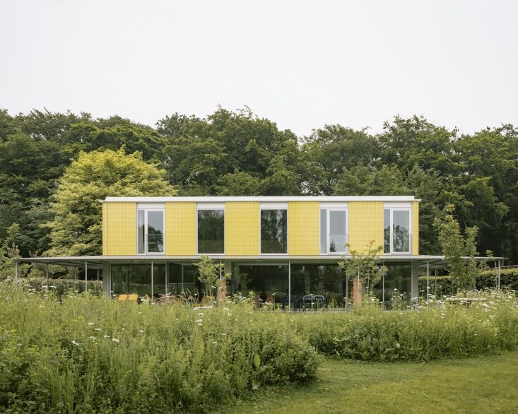 Between the forest and the sea: A steel-framed, tiled vacation rental ...