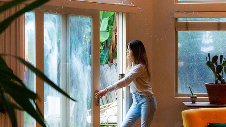 Cover sliding glass doors in style with a cute button curtain DIY