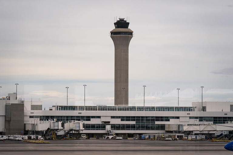 Denver airport issues ground stop over bad weather
