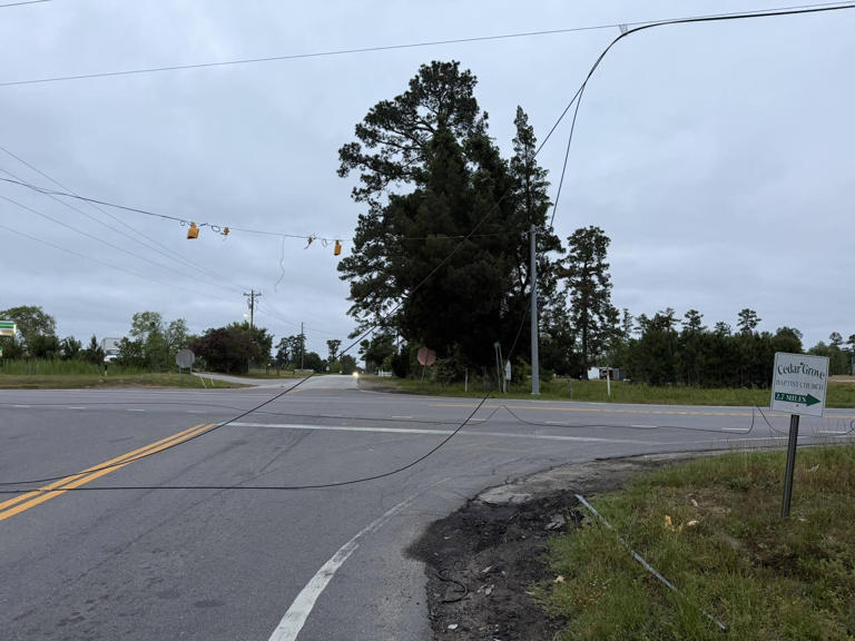 Downed utility line blocks lanes on Highway 378 in Horry County