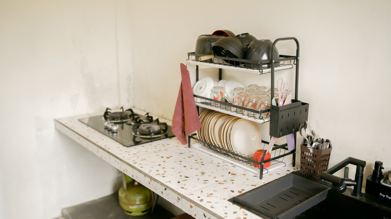 Dish racks cluttering your counters? This item does the trick (it's not ...