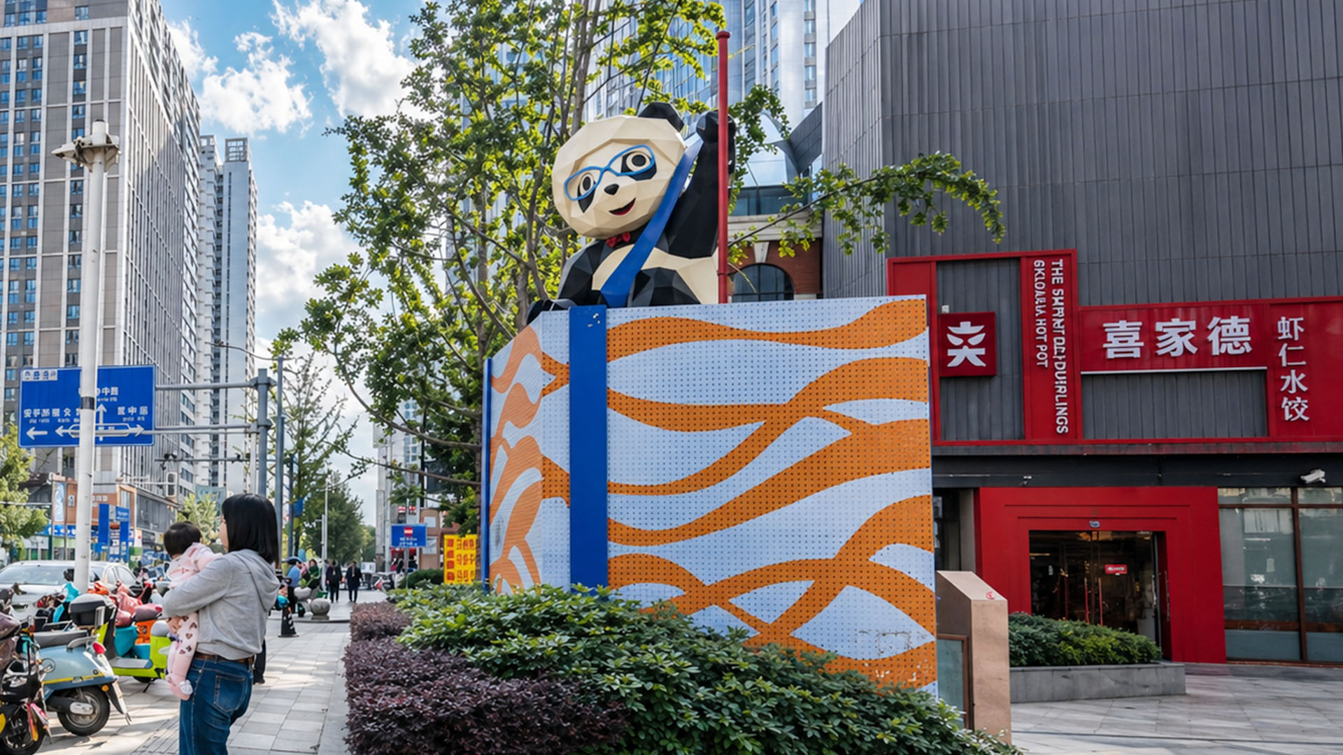 This street in China features a giant panda watching everyday city life