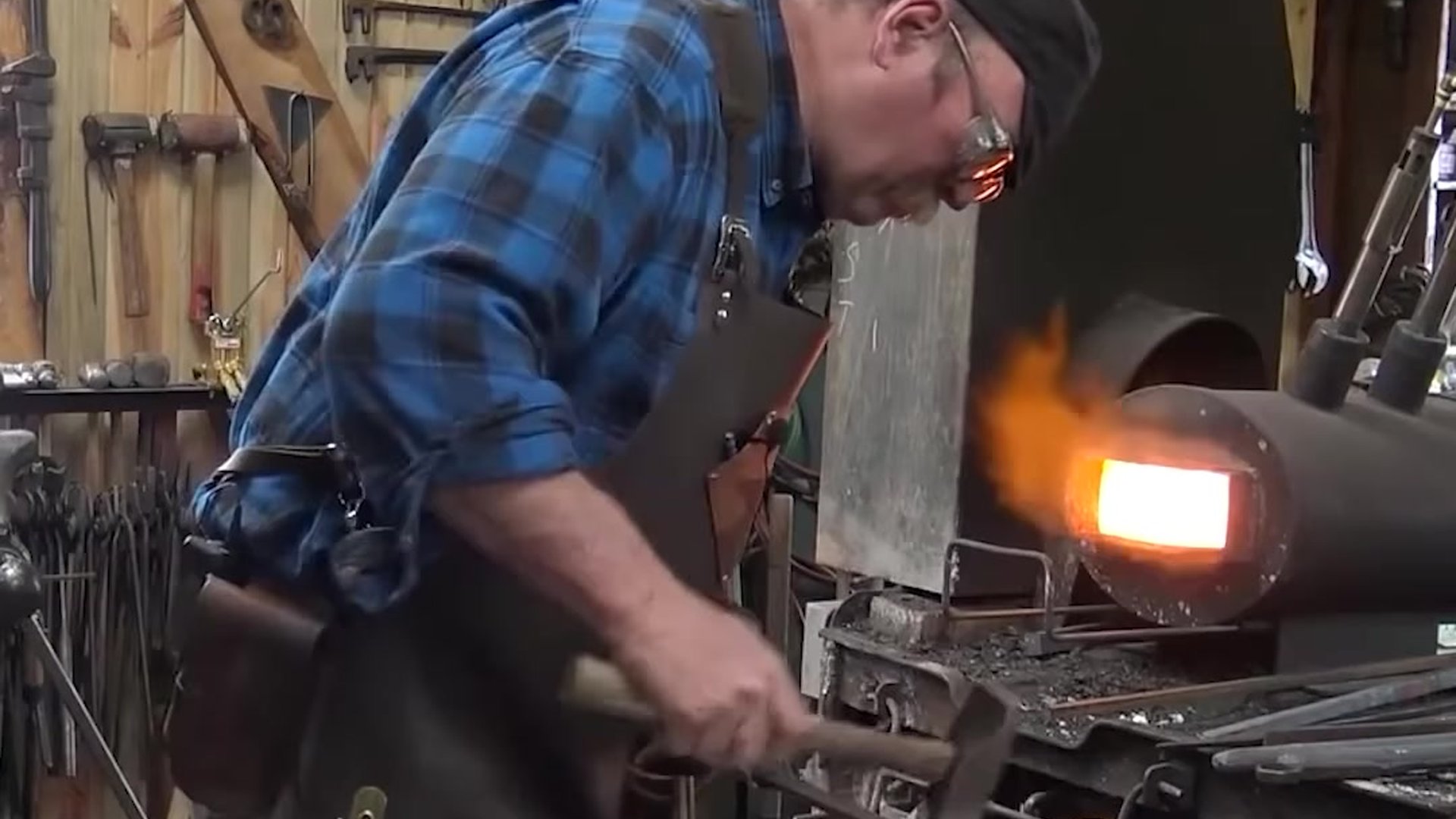 Heating and shaping a forged tomahawk